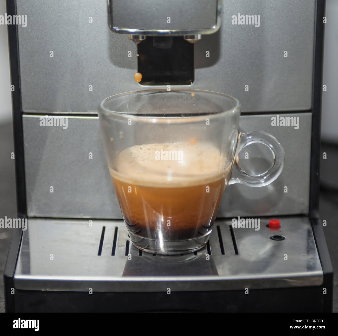 Coffee machine with glass of black coffee Stock Photo - Alamy