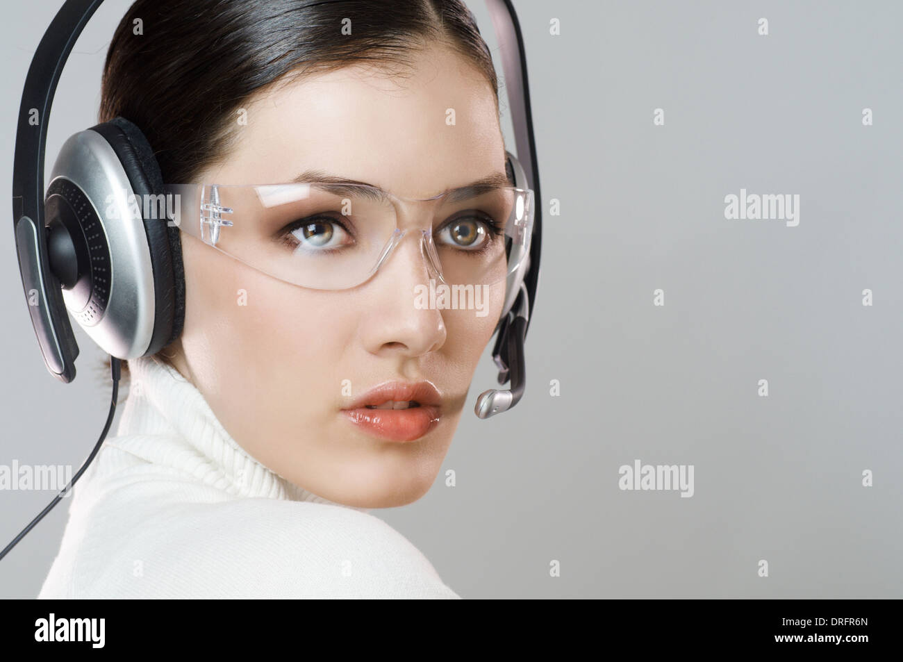 a beauty business woman wearing a headset Stock Photo - Alamy