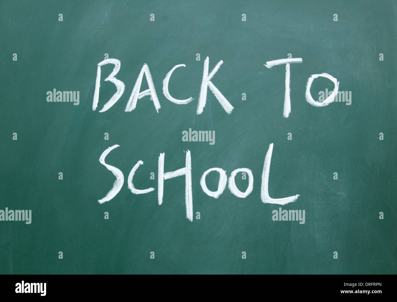 back to school word write on blackboard Stock Photo - Alamy