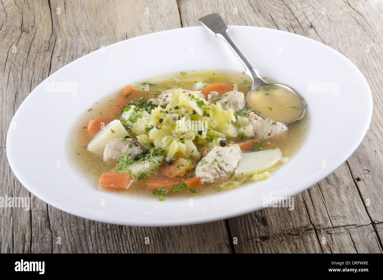 irish chicken stew in a white bowl Stock Photo - Alamy