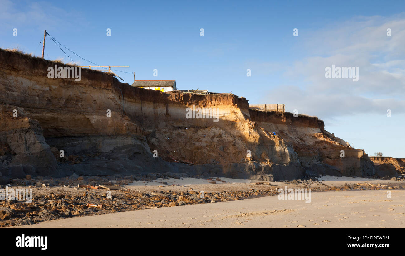 Crumbling cliffs at Happisburgh Beach in Norfolk England Stock Photo ...