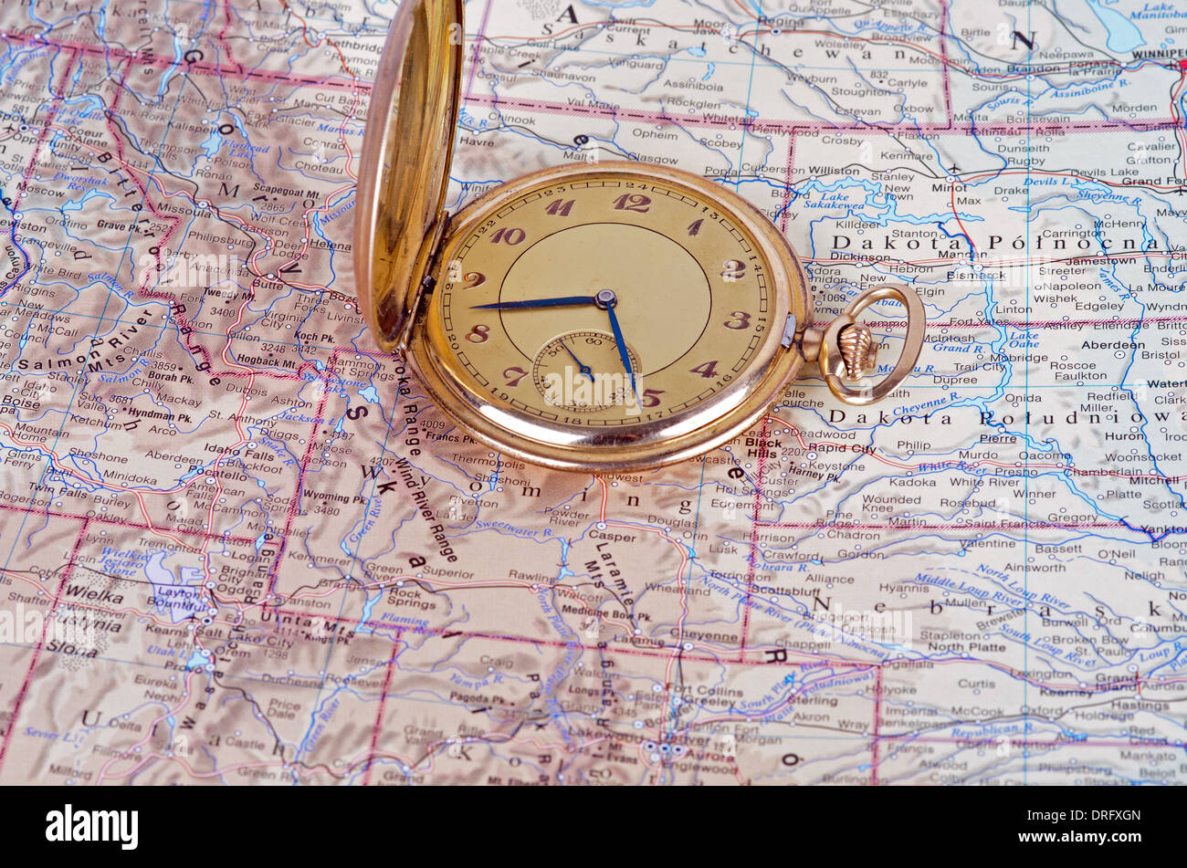 Photo of old watch on map Stock Photo - Alamy