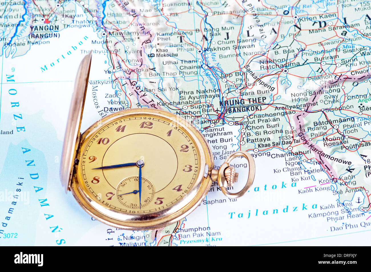 Photo of old watch on map Stock Photo - Alamy