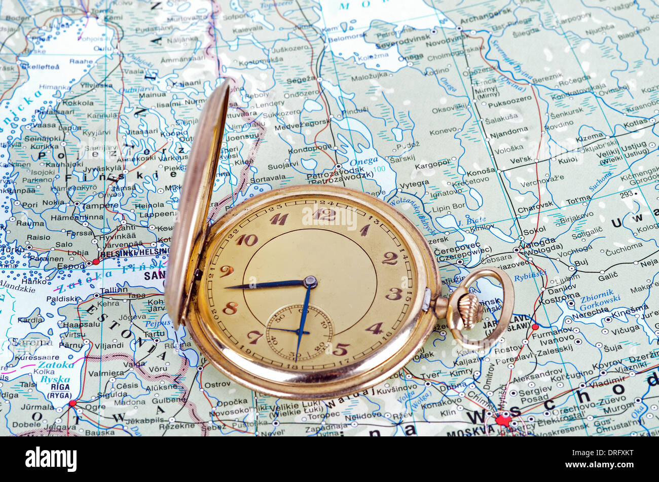 Photo of old watch on map Stock Photo - Alamy