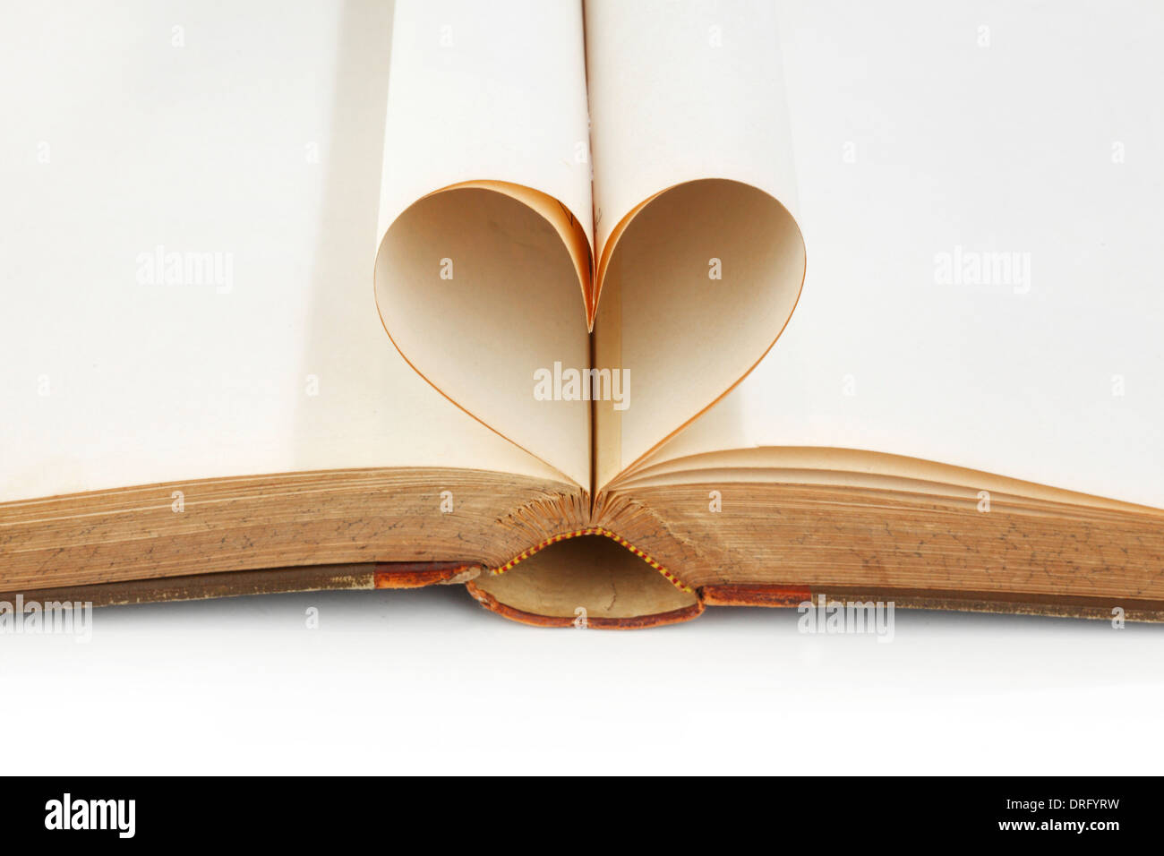 Heart made of blank pages inside a book on white background Stock Photo ...