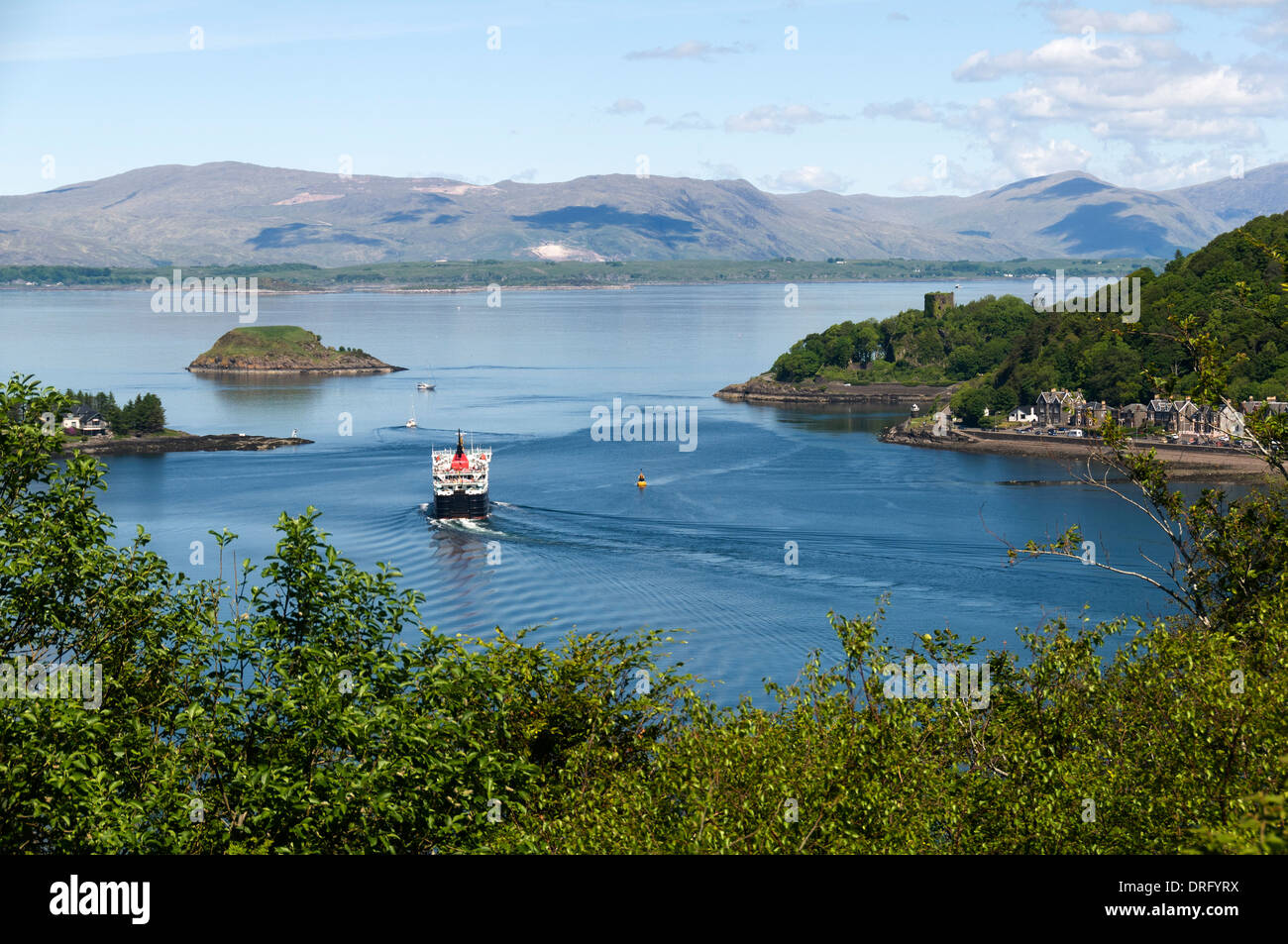 Caledonian MacBrayne's ferry in Oban Bay with the hills of Moidart ...