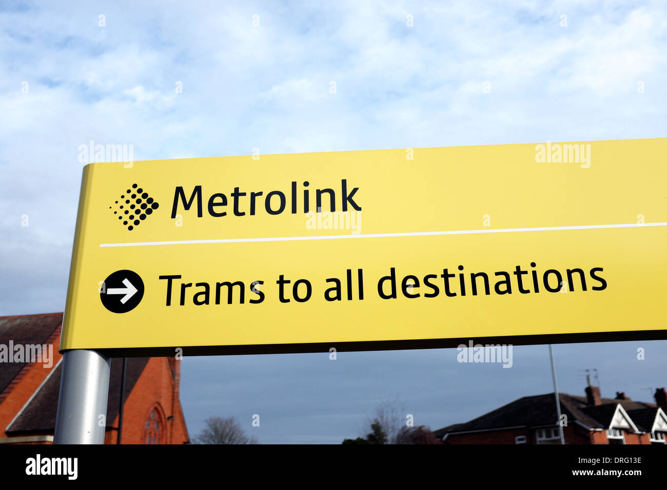 a signpost at didsbury village metrolink tram station Stock Photo - Alamy
