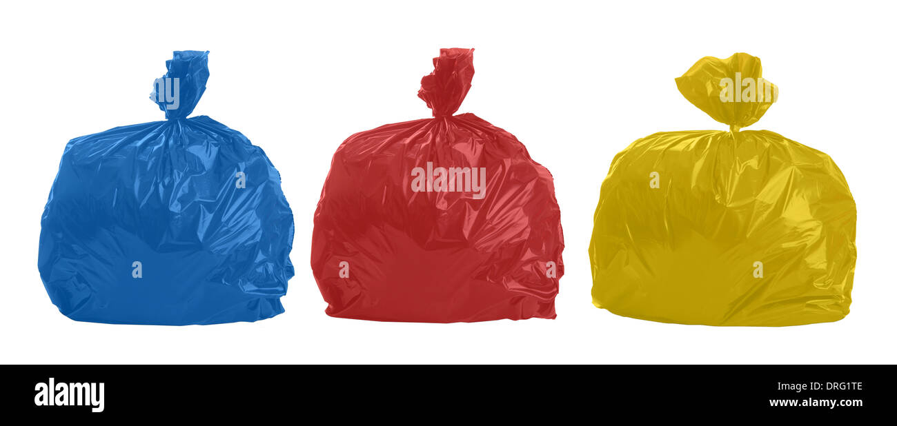 Three colored rubbish bags on white background Stock Photo - Alamy