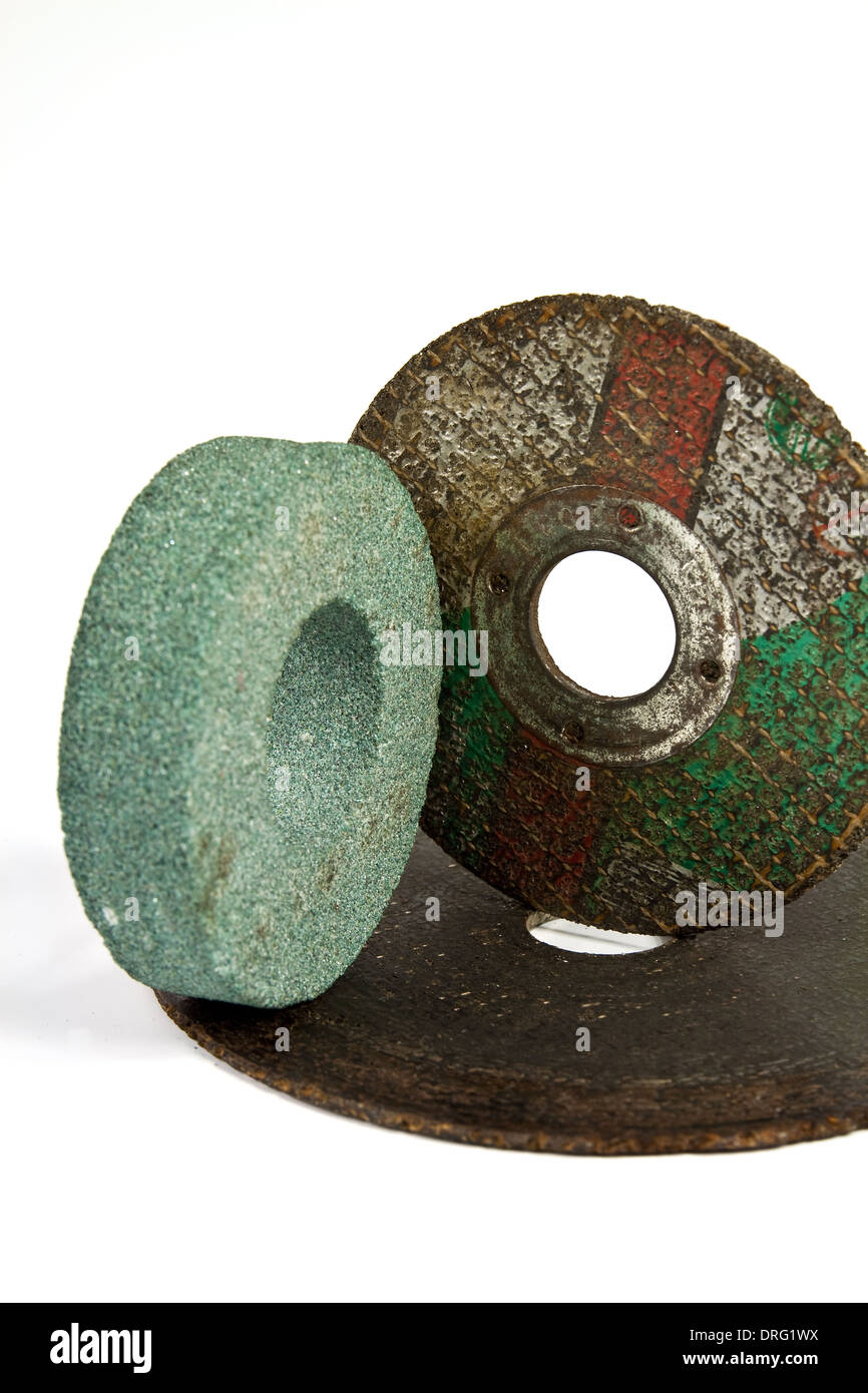 Different sizes used discs and emery grinder Stock Photo - Alamy