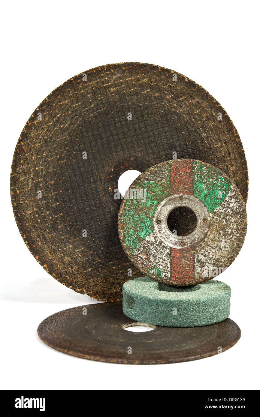 Different sizes used discs and emery grinder Stock Photo - Alamy