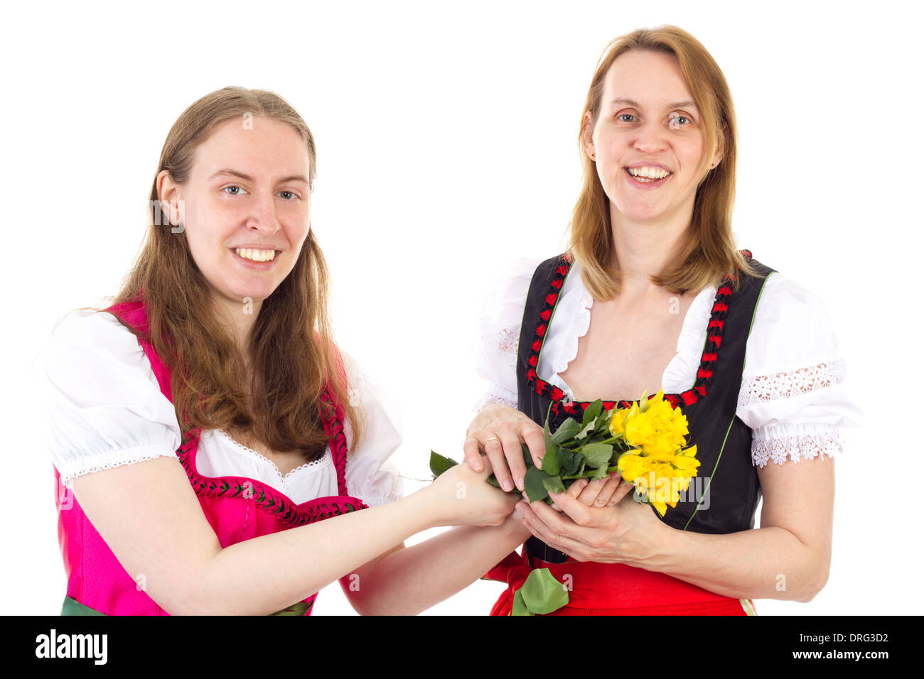 Happy mother getting bunch of roses from her daughter Stock Photo - Alamy