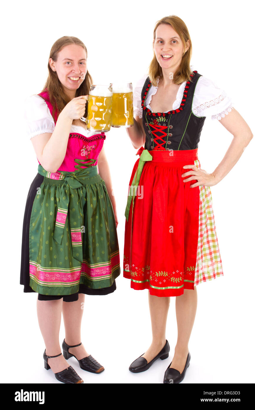 Beautiful women in dirndl drinking double beer at bavarian feast Stock ...