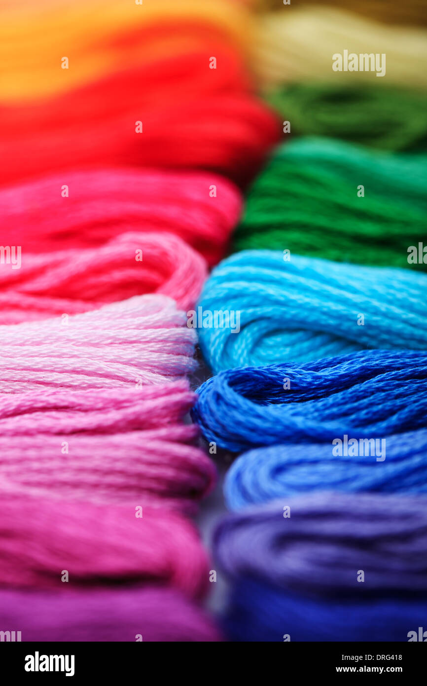 Close up embroidery floss, rainbow colours Stock Photo - Alamy