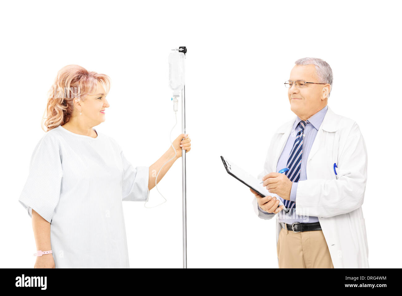 Female patient in hospital gown getting infusion and her doctor Stock ...
