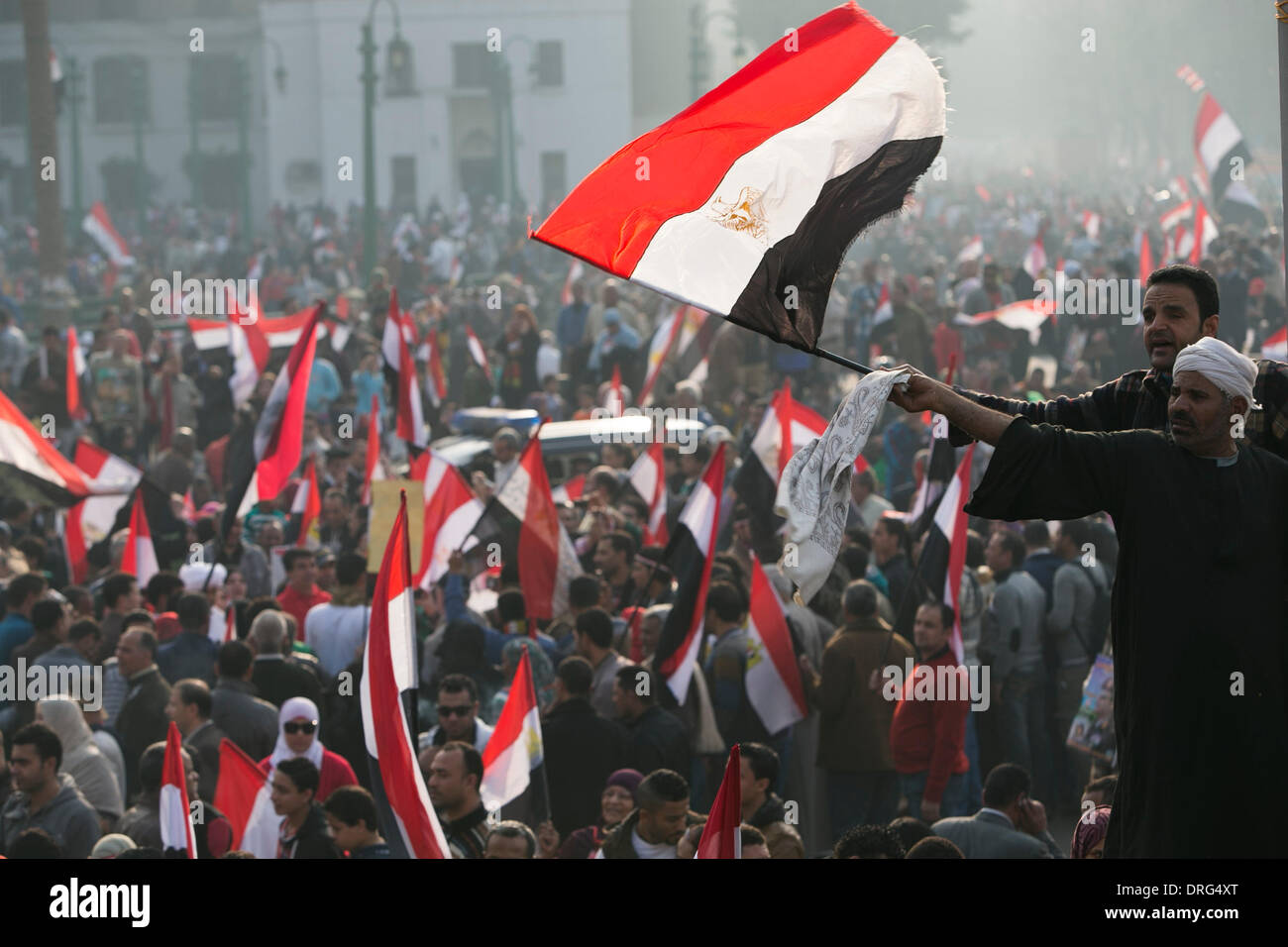 Cairo, Egypt. 25th Jan, 2014. Egyptians wave national flag during a ...
