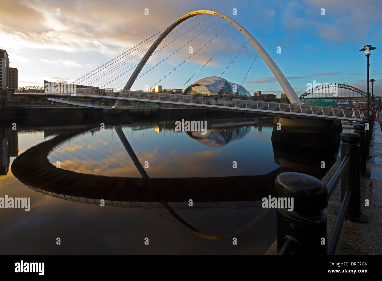 A view at dawn of The Gateshead Millennium Bridge on the River Tyne ...