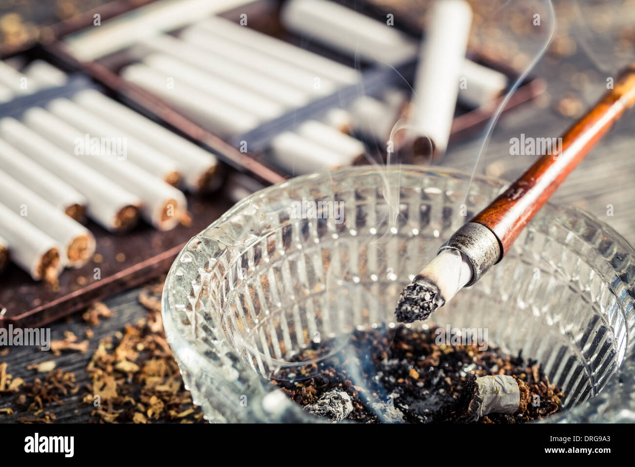 Closeup of fuming a cigarette in the old pipe Stock Photo - Alamy