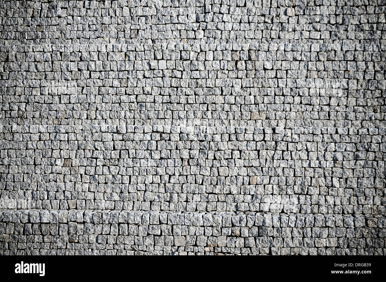 Cobbled pavement pattern made of granite cubes Stock Photo - Alamy