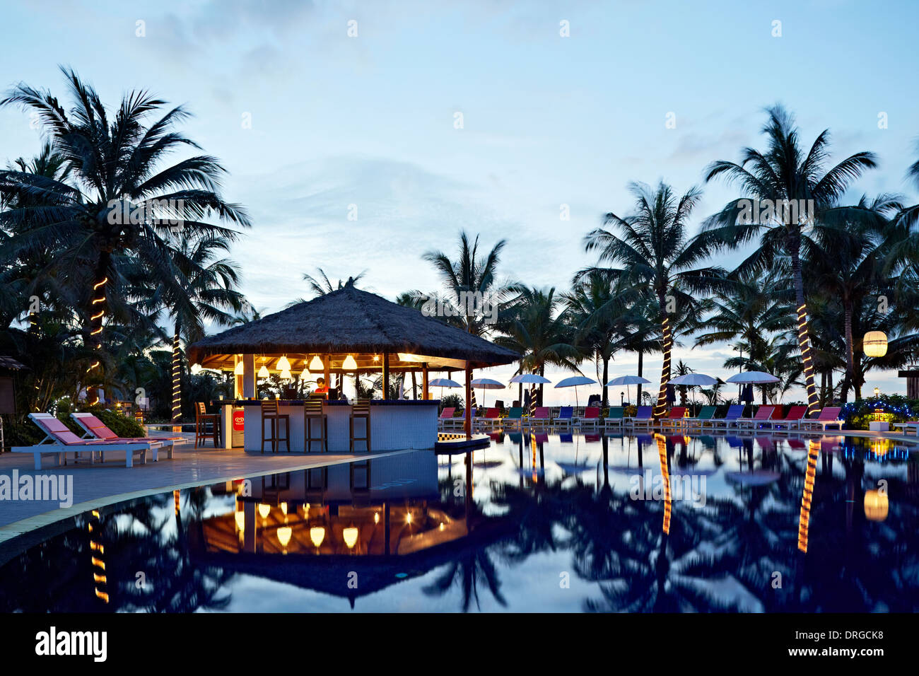 Swimming pool at dusk Stock Photo - Alamy