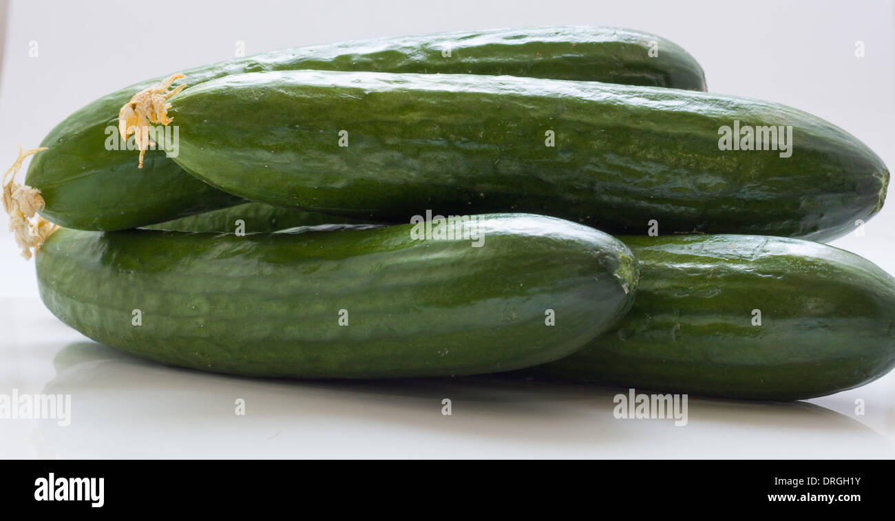 Beautiful photo of fresh cucumbers isolated on white background Stock ...
