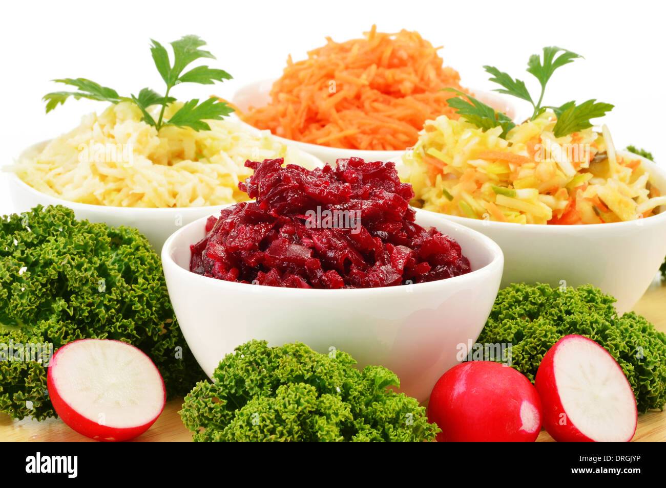 Composition with four vegetable salad bowls Stock Photo - Alamy