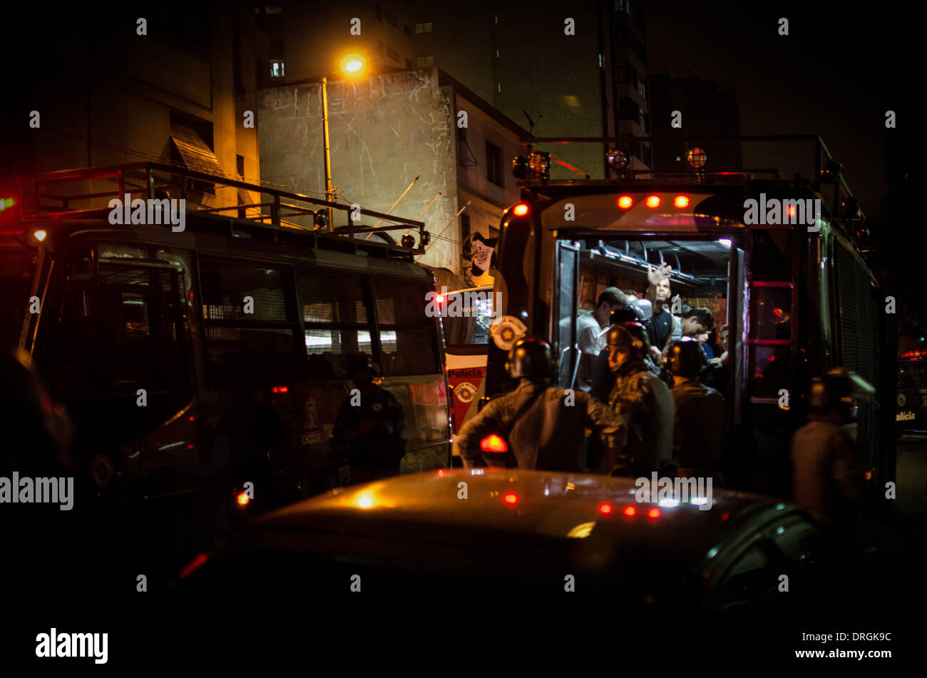 Sao Paulo, Brazil. 25th Jan, 2014. People are loaded into police buses ...