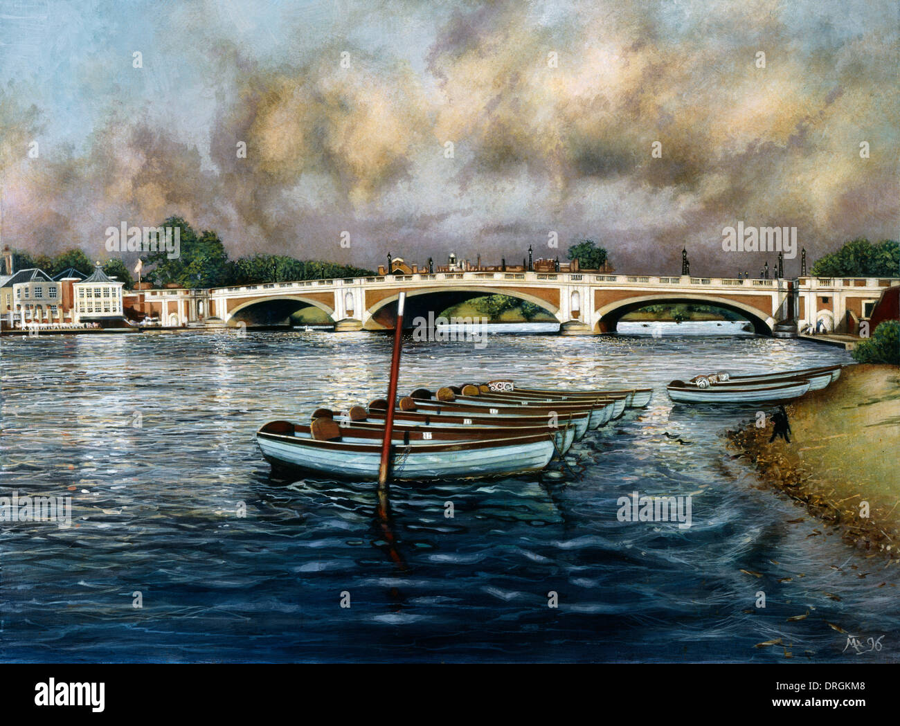 Hampton court bridge with rowing boat on river Thames in London with ...