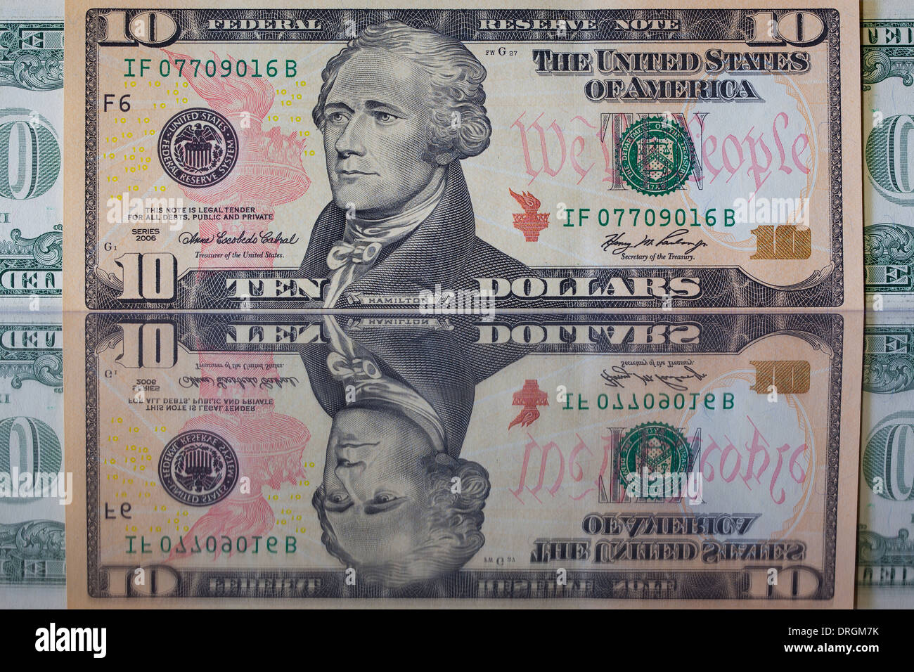 U.S. dollars on the table with mirror Stock Photo - Alamy