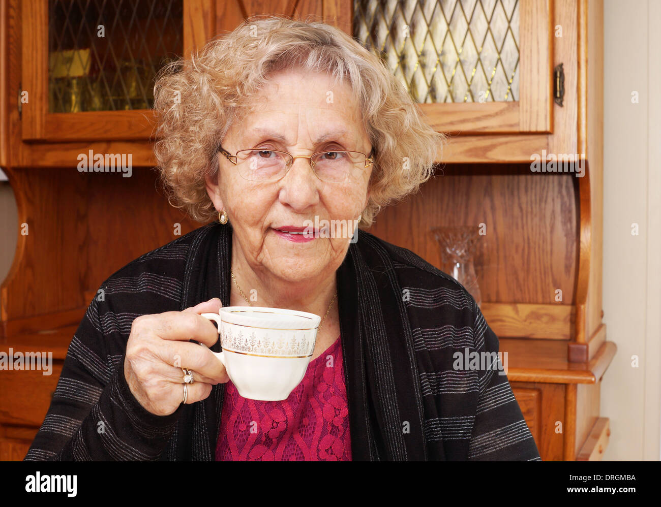 Vintage woman drinking tea hi-res stock photography and images - Alamy