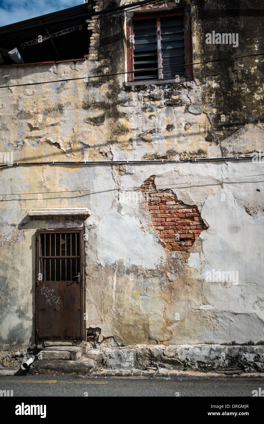 Crumbling brickwork on a building in the historic district of George ...