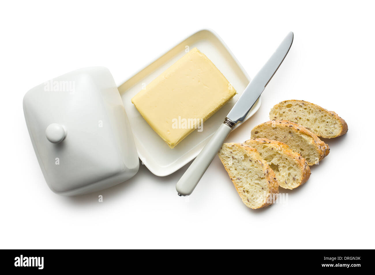 top view of butter with sliced bread on white background Stock Photo ...
