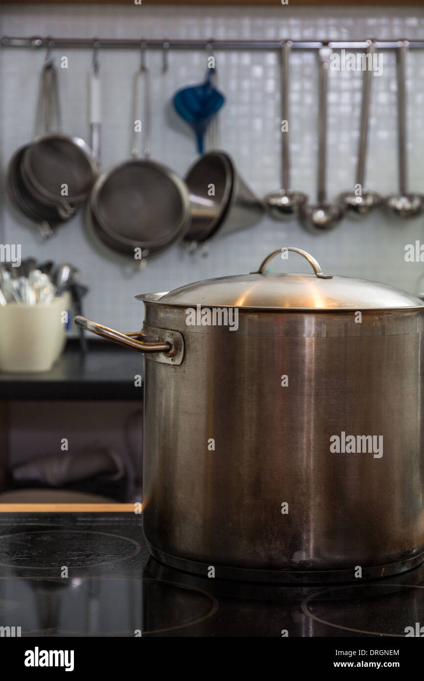 Big saucepan on the plate Stock Photo - Alamy
