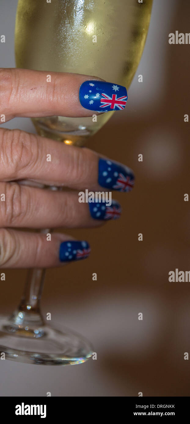 hands with nails painted with Australian flags placed on antique ...