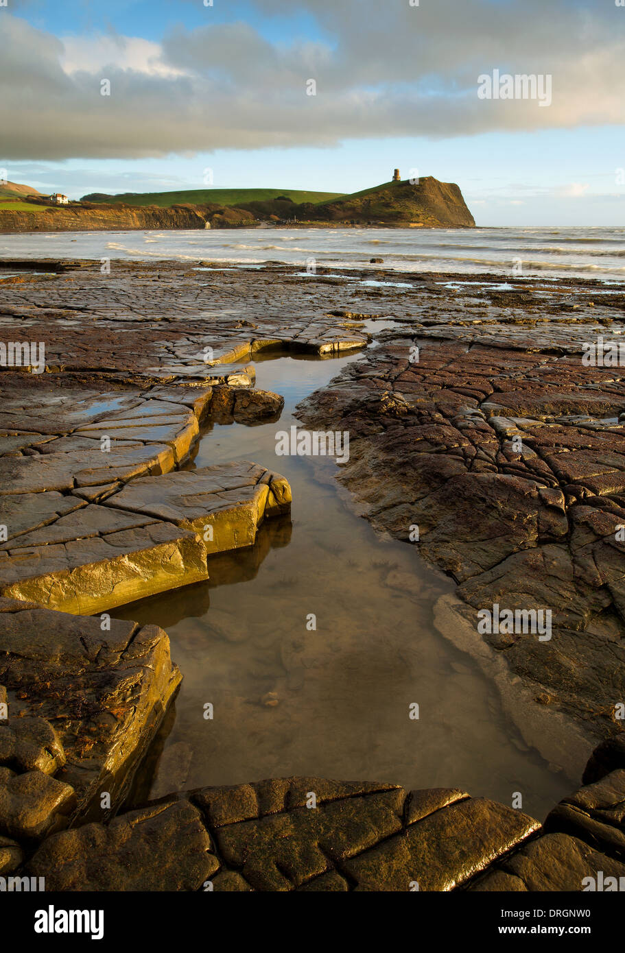 Late evening sun highlights the rock ledges and tidal pools at ...