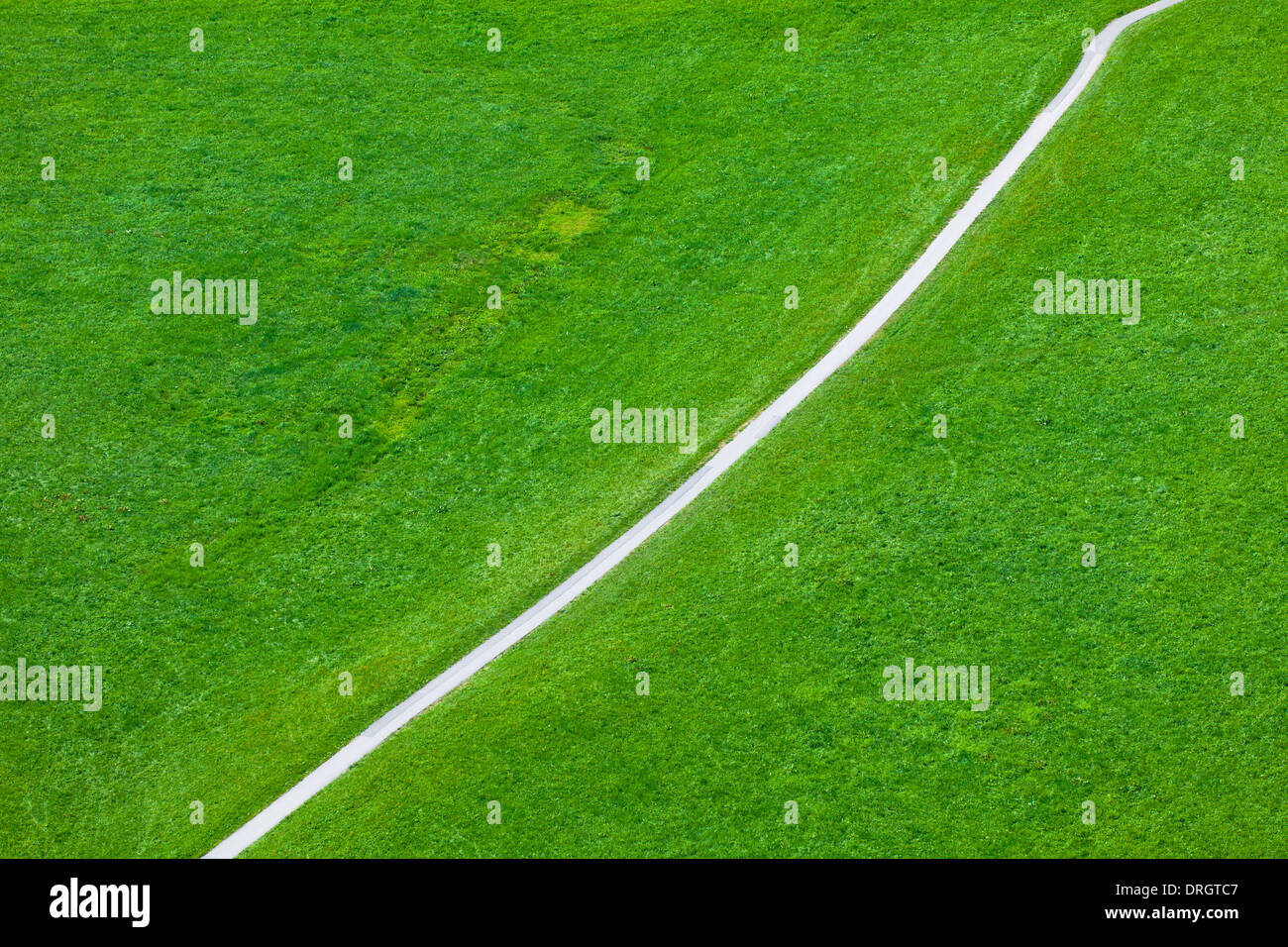 Walking footpath in green field. Horizontal shot Stock Photo - Alamy
