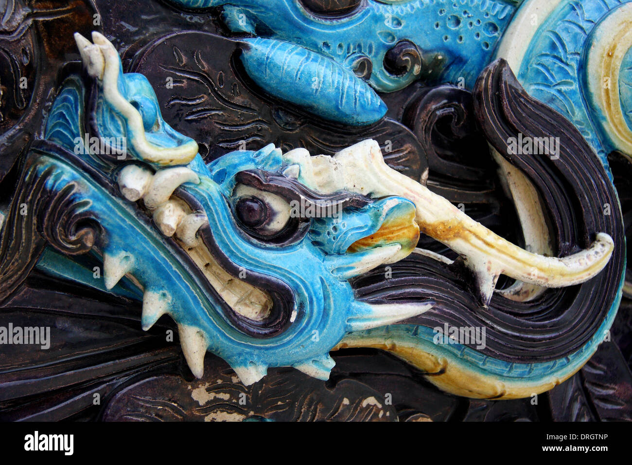 Detail of ceramic dragon tiles from Shanxi Province in China on display ...