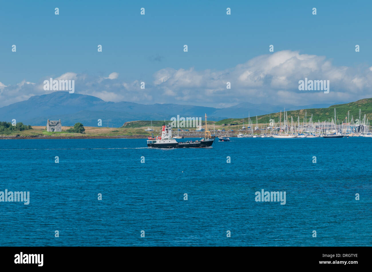 Caledonian Macbrayne car ferry passing marina Ardentrive Bay Isle of ...