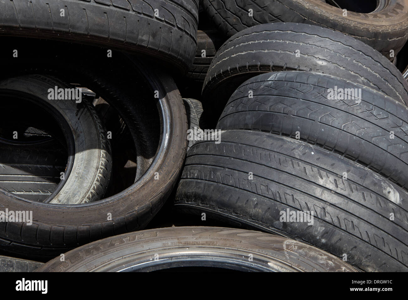 A pile of old tyres Stock Photo - Alamy