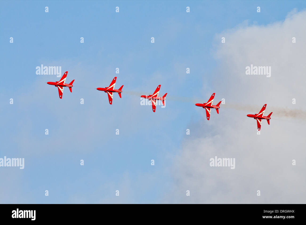 Five Red Arrows in Formation Stock Photo - Alamy