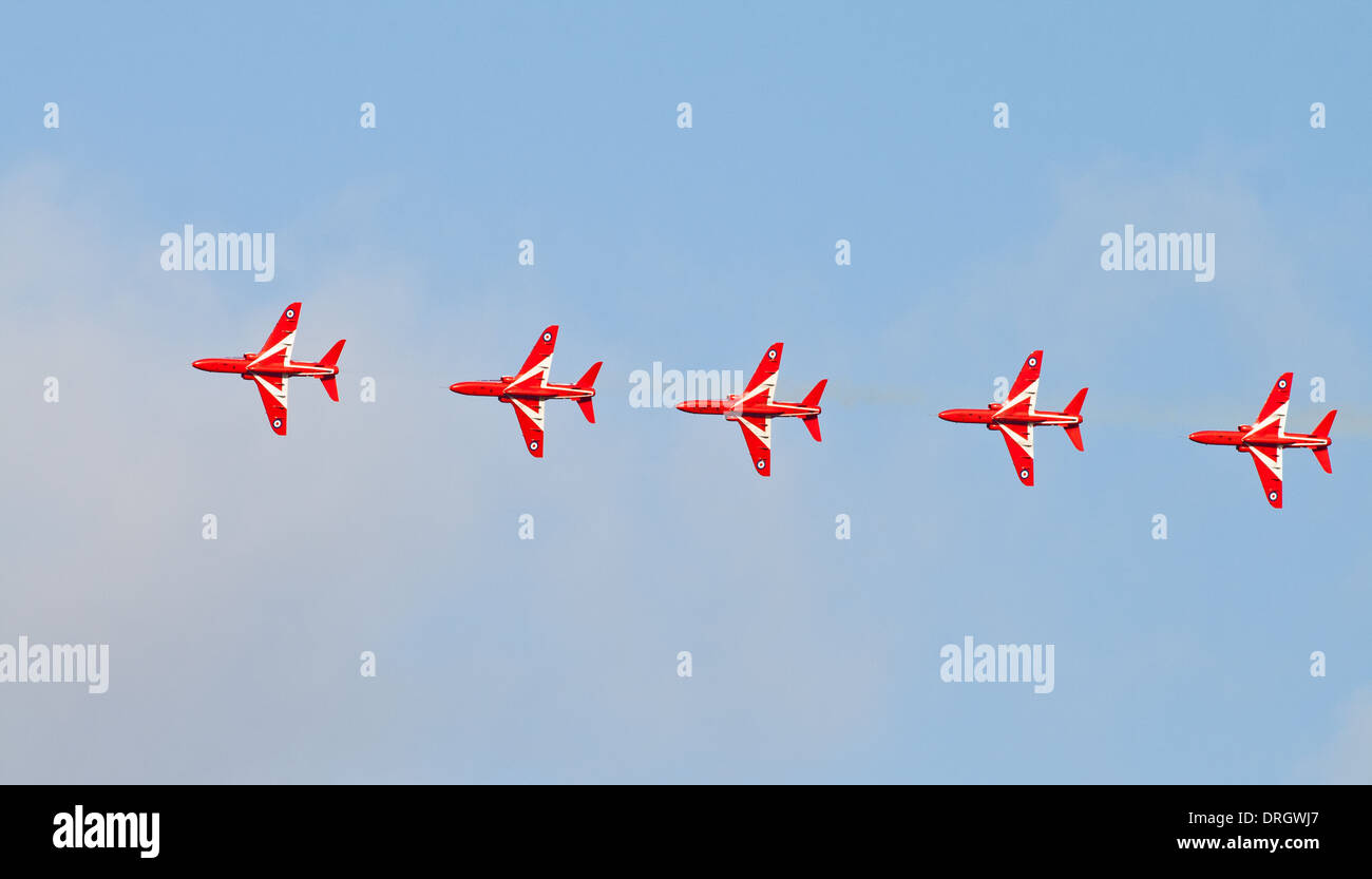 Five Red Arrows in Formation Stock Photo - Alamy
