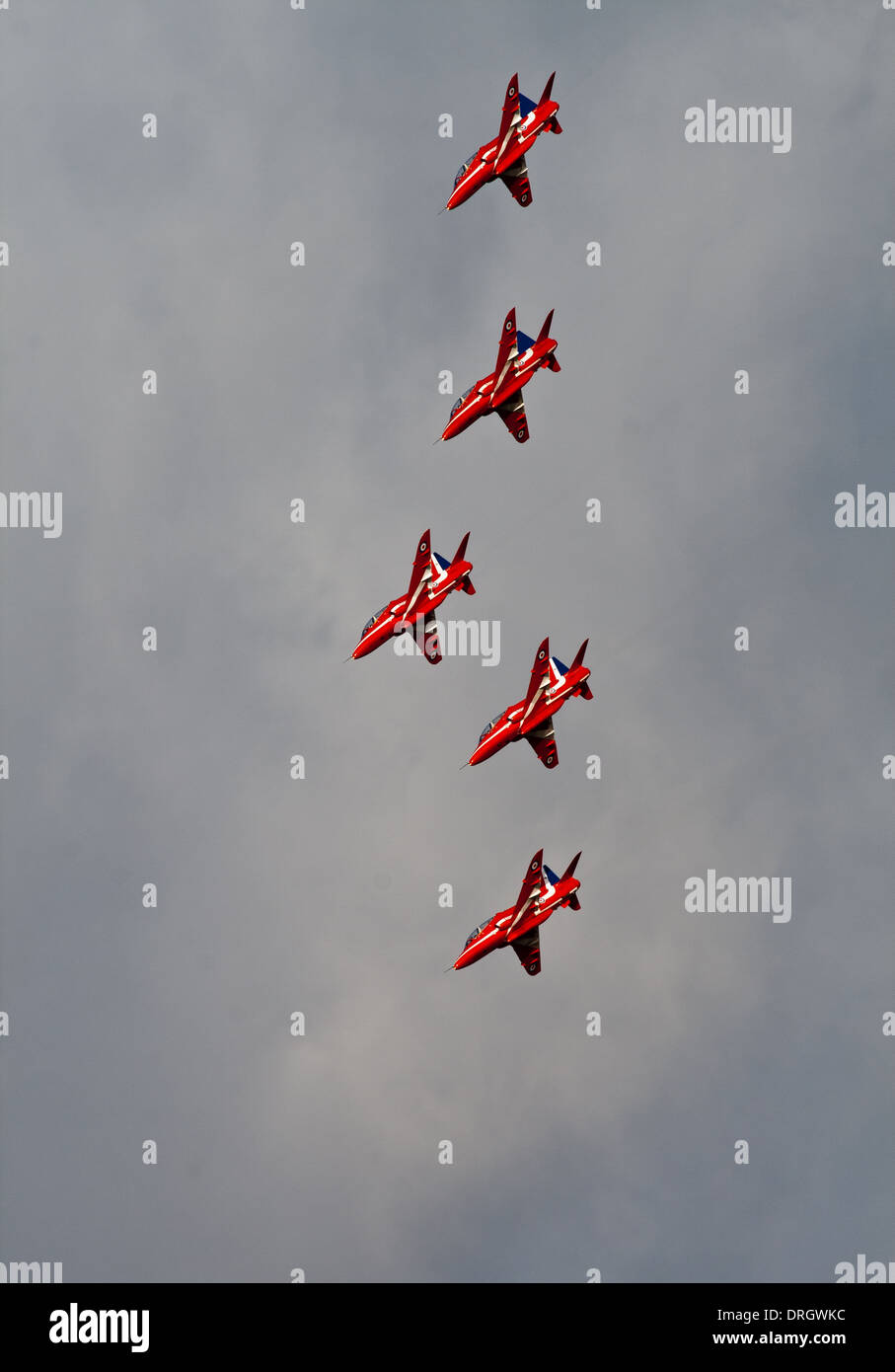 Five Red Arrows in Formation Stock Photo - Alamy