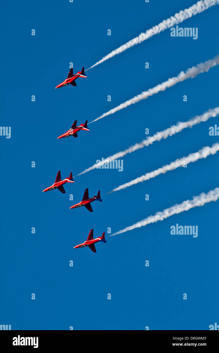 Five Red Arrows in Formation Stock Photo - Alamy