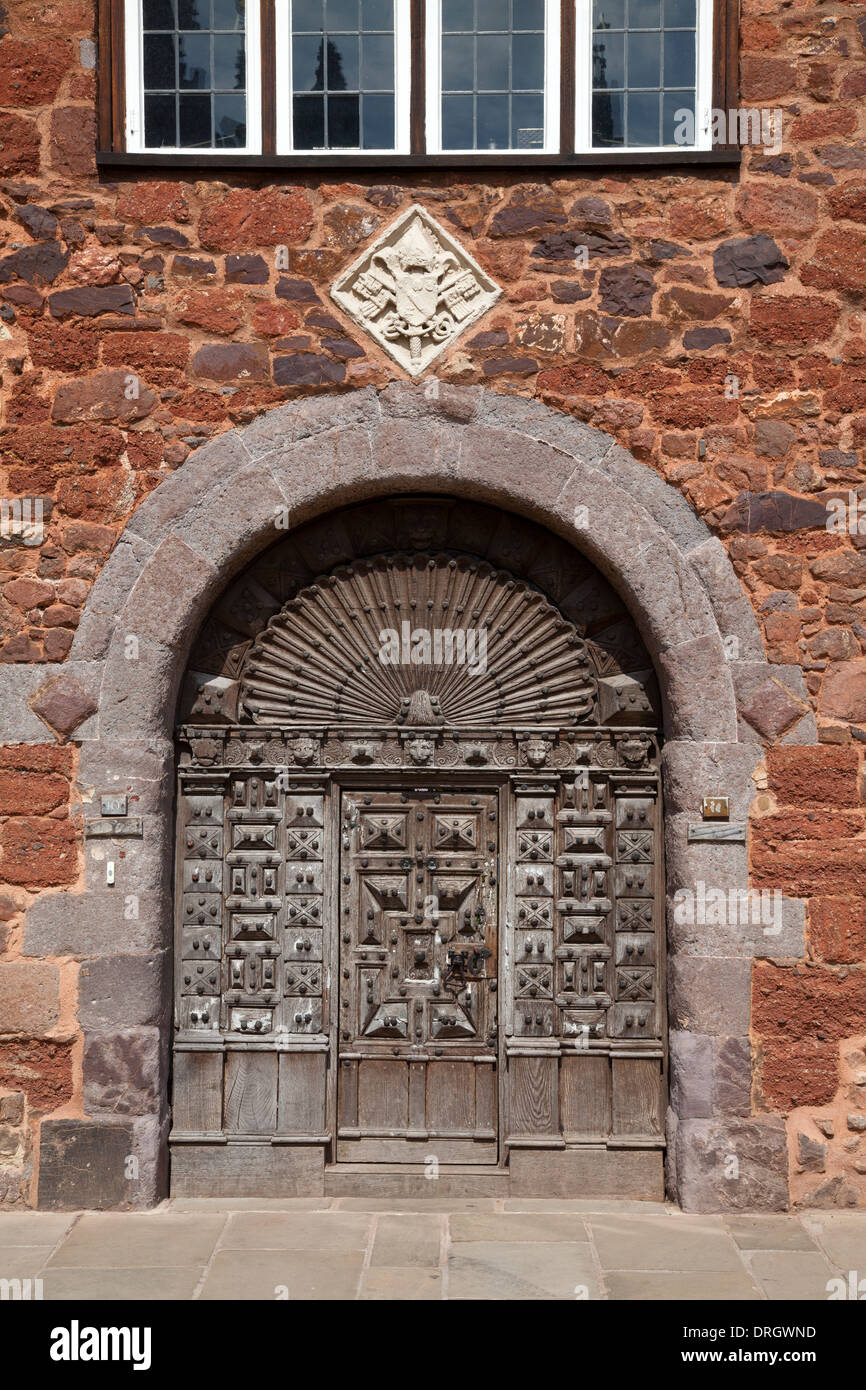 Old decorative doorway in Cathedral Close, Exeter, Devon Stock Photo ...