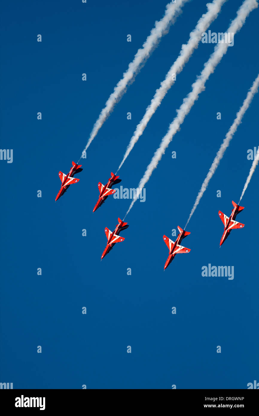 Five Red Arrows in Formation Stock Photo - Alamy