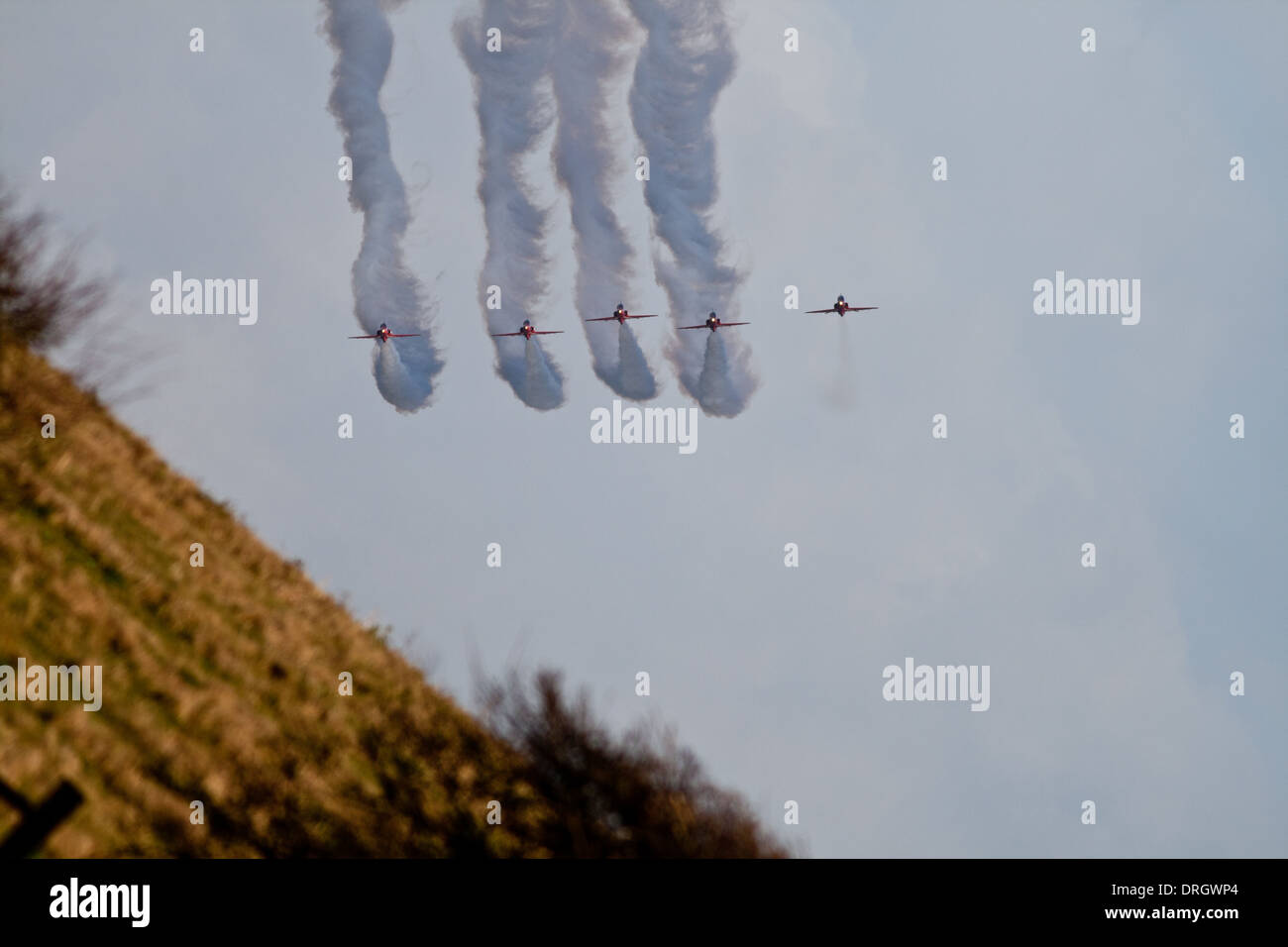 Five Red Arrows in Formation Stock Photo - Alamy