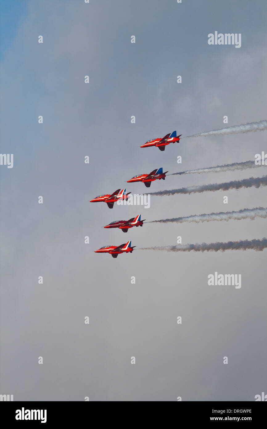 Five Red Arrows in Formation Stock Photo - Alamy