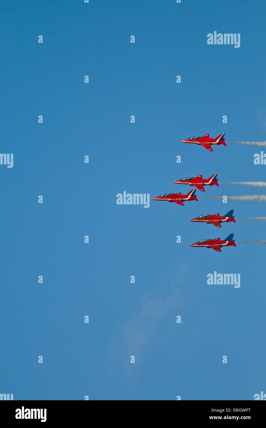 Five Red Arrows in Formation Stock Photo - Alamy