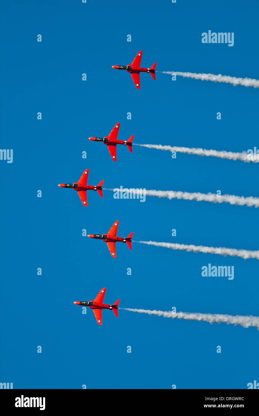 Five Red Arrows in Formation Stock Photo - Alamy