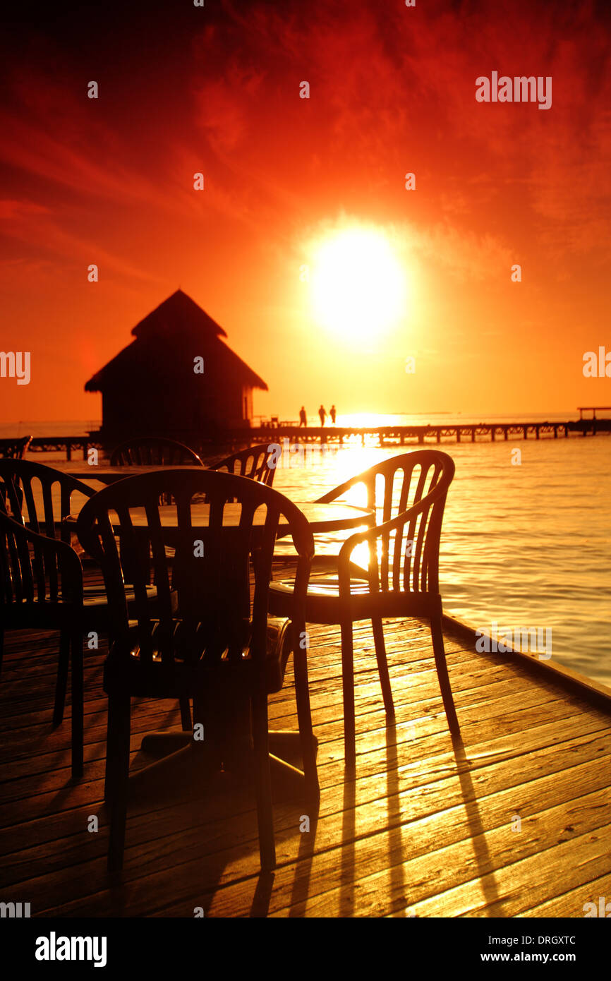 tropical cafe on the sunset Stock Photo - Alamy