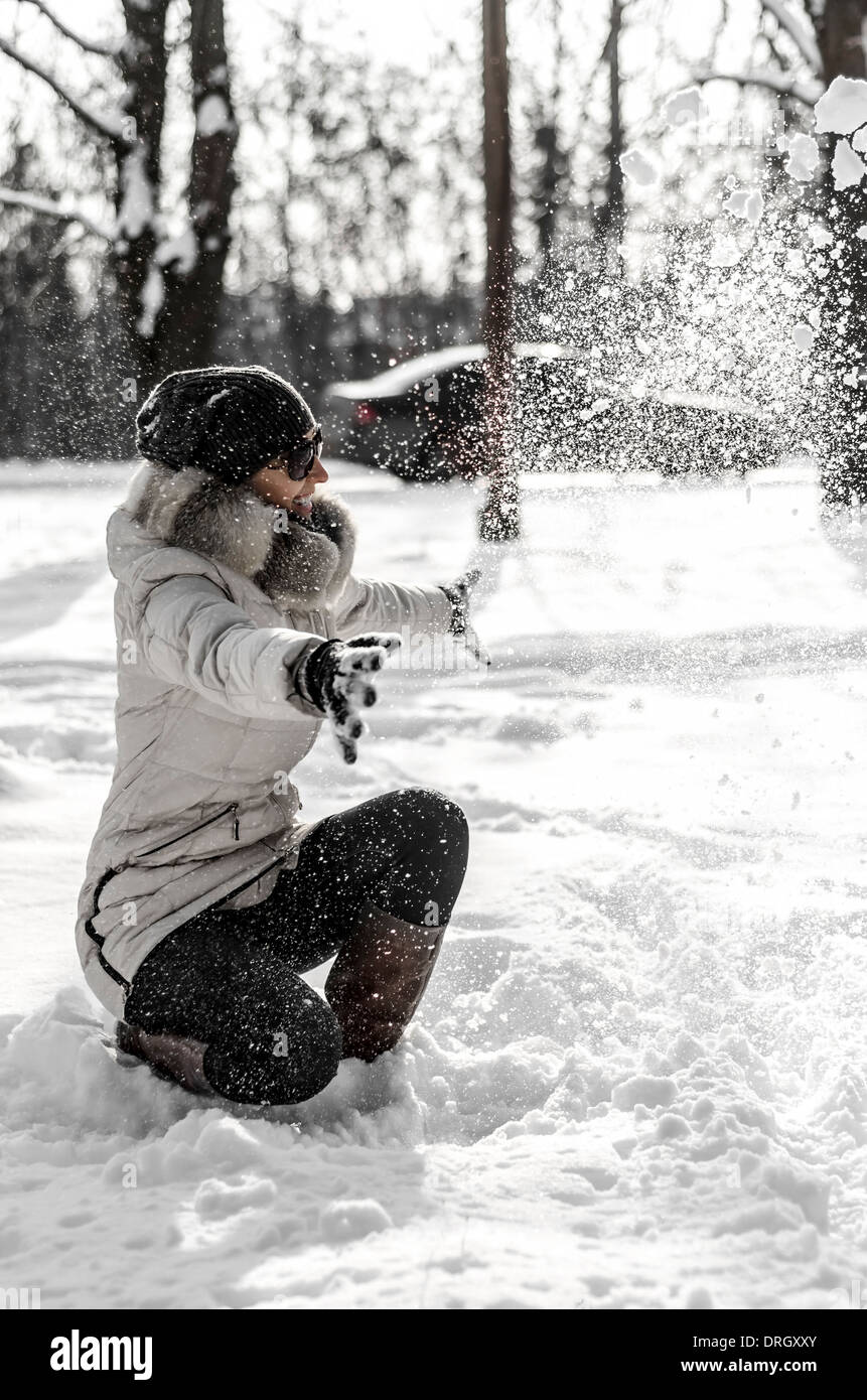 Teenager playing in snow hi-res stock photography and images - Alamy
